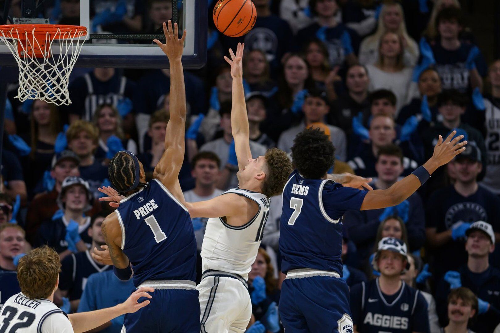 Mason Falslev scores 26 points to help No. 23 Utah State beat Nevada 71-62