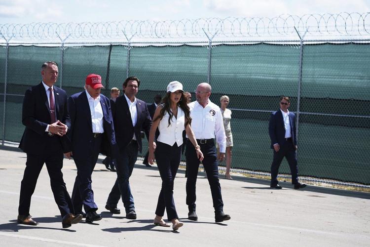 Photos of Trump touring an immigration detention center dubbed ...