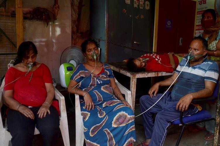 India launches effort to inoculate all adults against COVID