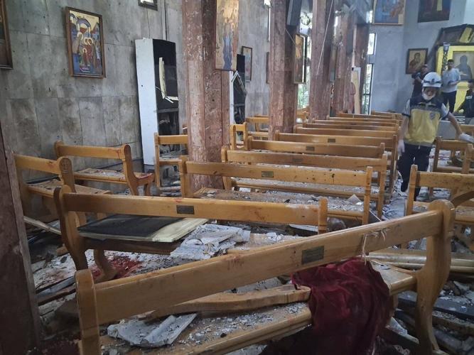 Suicide bomber kills at least 22 in Greek Orthodox church in Syria ...