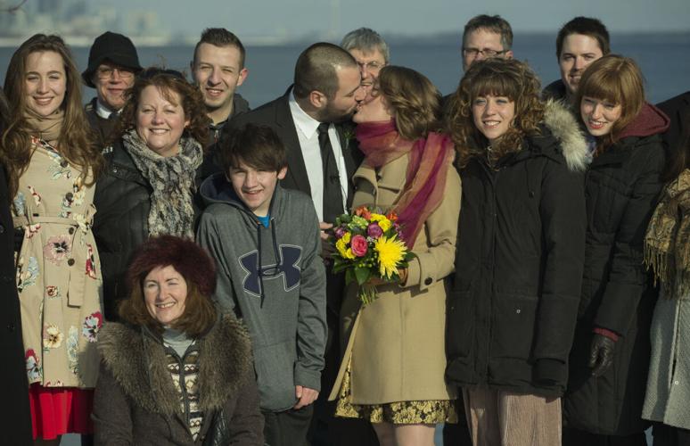 Warm hearts on a cold Lake Ontario shore as couple ties the knot