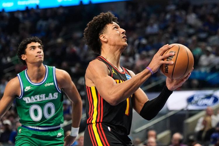 Hawks beat the Mavericks 135-120 for their 11th straight win