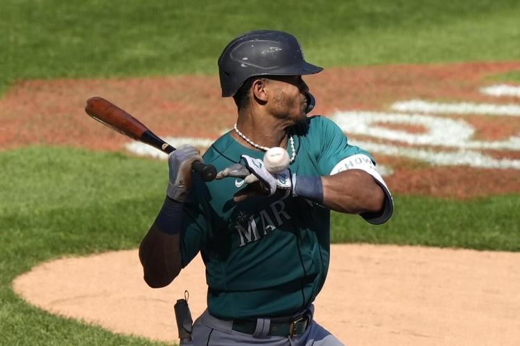 Anderson scores winning run in the 10th as the White Sox end Mariners ...