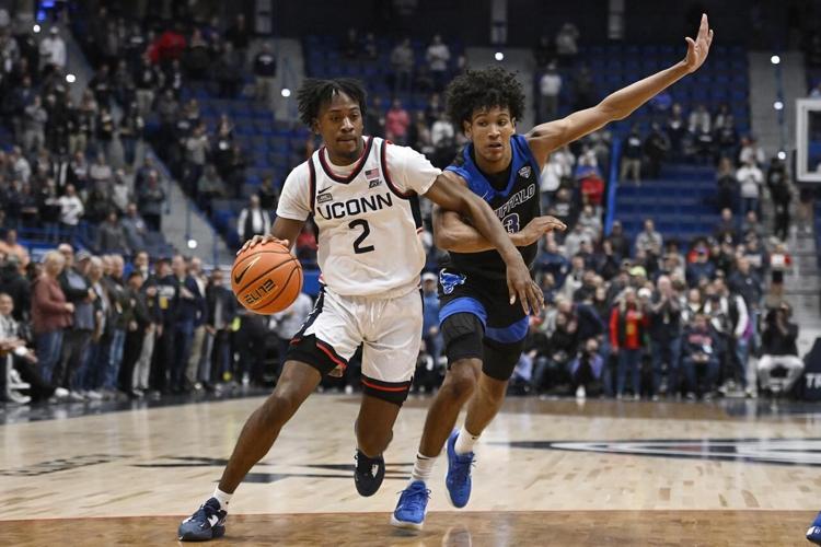 Newton’s triple-double leads No. 25 UConn past Buffalo