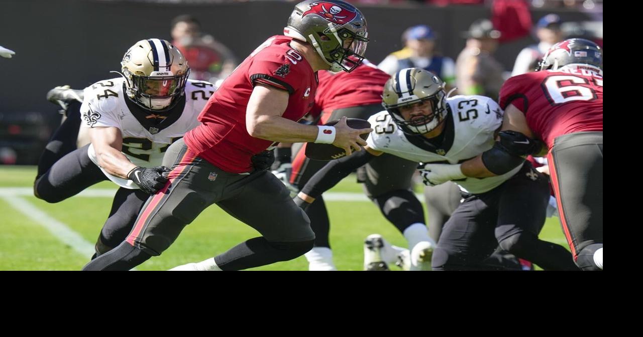 QB Mayfield hurts ribs as Bucs lose 23-13 to the Saints and waste chance to clinch title at home