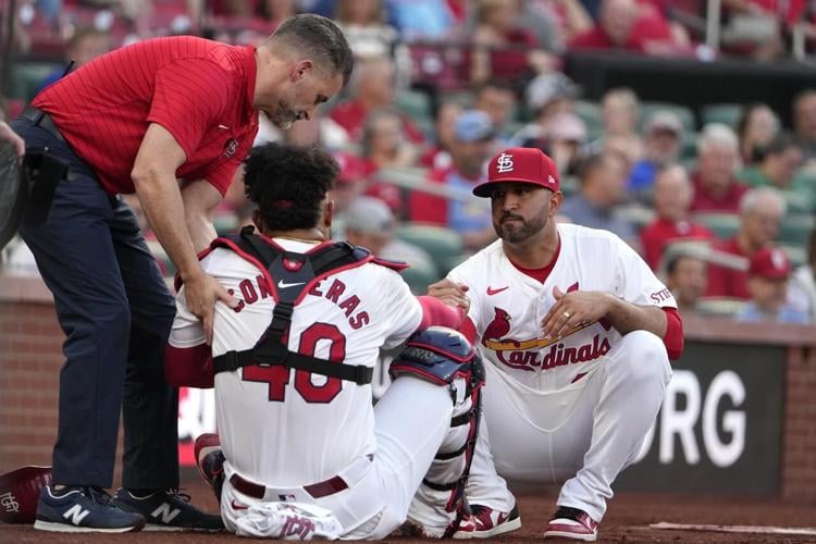 Cardinals catcher Willson Contreras breaks left forearm when hit by J.D ...