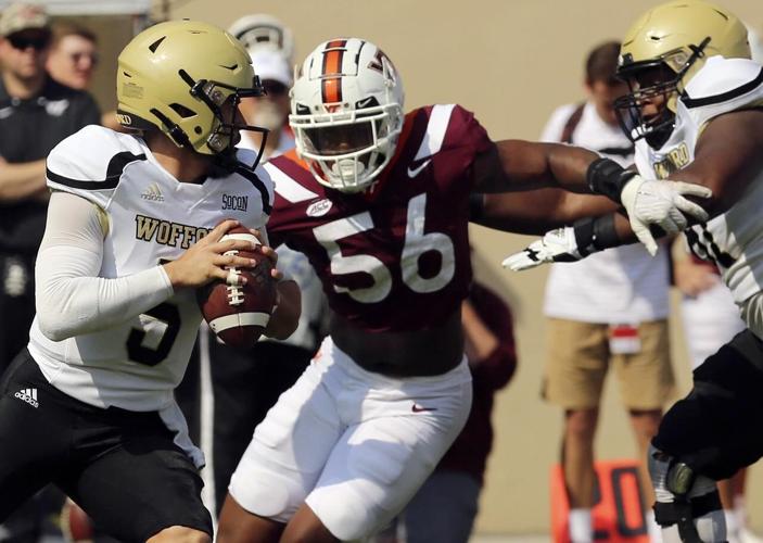 Wells’ 2 TD passes lead Hokies past Wofford 27-7