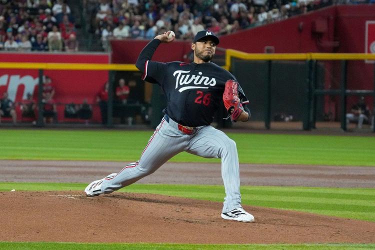 Buxton hits grand slam in 10-run inning, Twins rout Diamondbacks 16-8