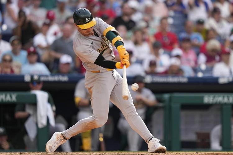 Harper, Turner homer and Phillies beat A's 11-5 to give Phillips the ...