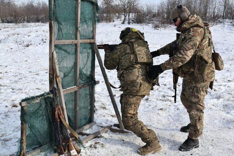 Ukraine endures a bitter winter after Russian attacks as peace efforts ...