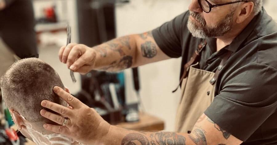 Brad Ross trades in his power suit for barber’s clippers