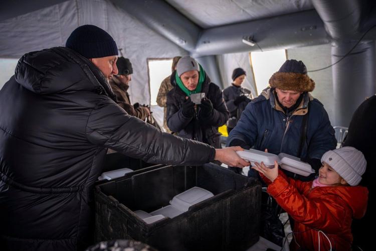 Ukrainians endure freezing temperatures at home as emergency crews rush ...