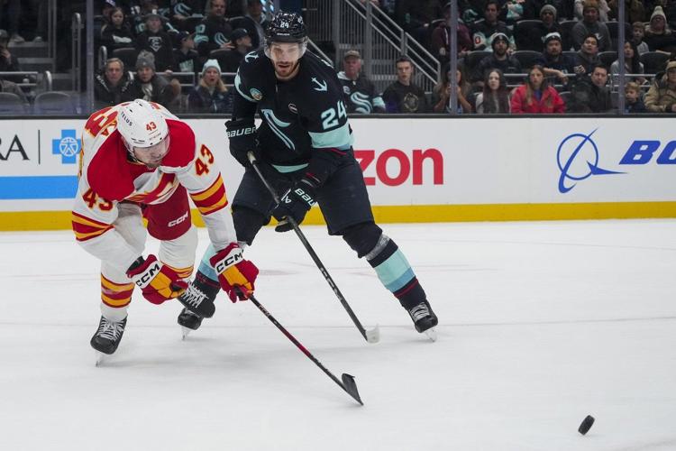 Flames score three times in first period, hang on to beat Kraken 3-2