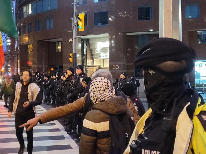 Pro-Palestinian protesters march through downtown Toronto