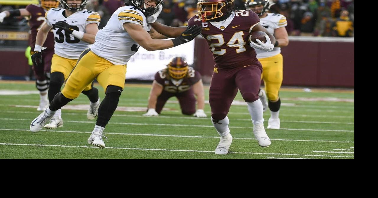 Iowa edges Minnesota 13-10 to keep Floyd, control B1G West