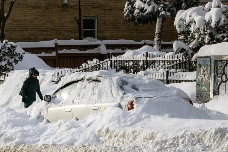 Schools will reopen Tuesday, but snow clearing woes continue
