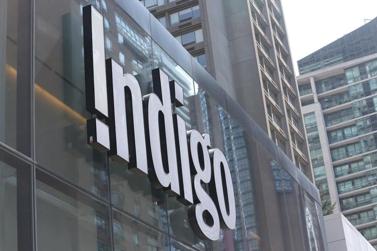 Toronto Indigo vandalized with red paint and posters