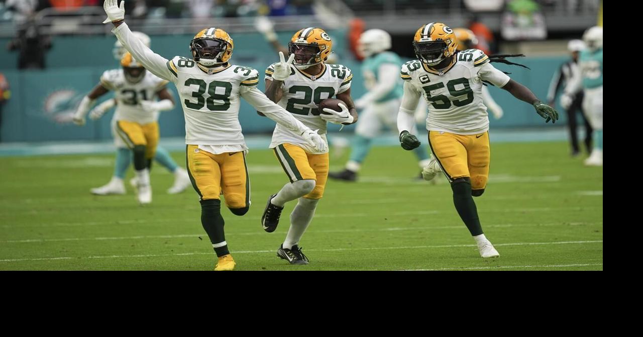 Packers intercept 3 passes in 4th, beat Tua, Dolphins 26-20
