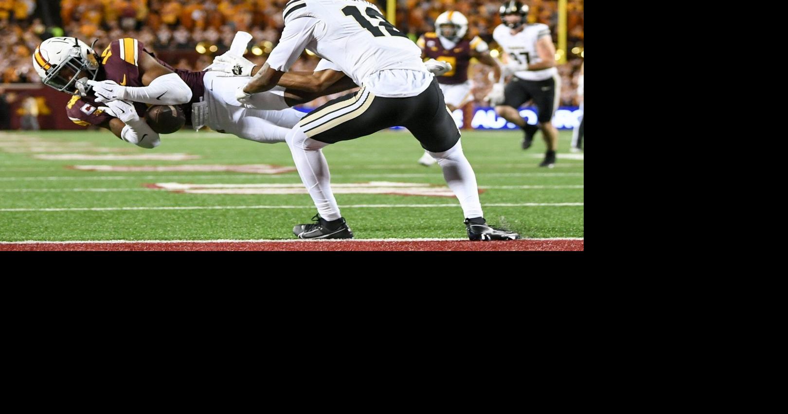 Koi Perich's interception return lifts Minnesota over Purdue 27-20