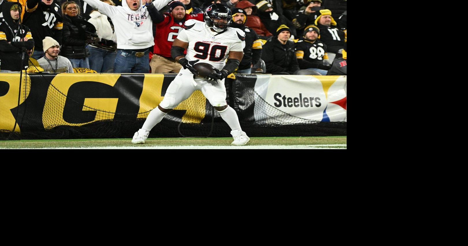 Texans secure first road playoff win with suffocating defensive performance