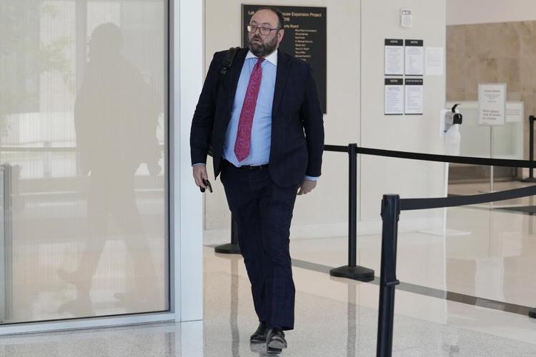 Father charged with helping suspect in July 4 shooting obtain gun ...