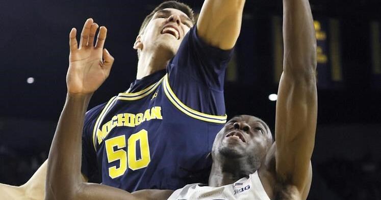 Tre Donaldson scores 7 during Michigan's game-closing 9-0 run for a 76 ...