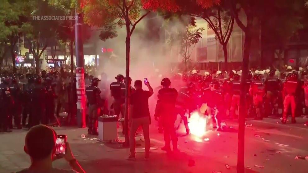 Dozens of anti-government protesters detained during clashes with riot ...