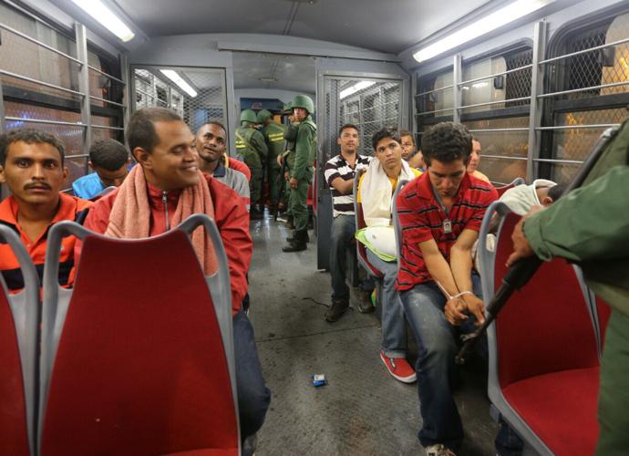 Venezuelan prison inmates evacuated after clashes kill 61