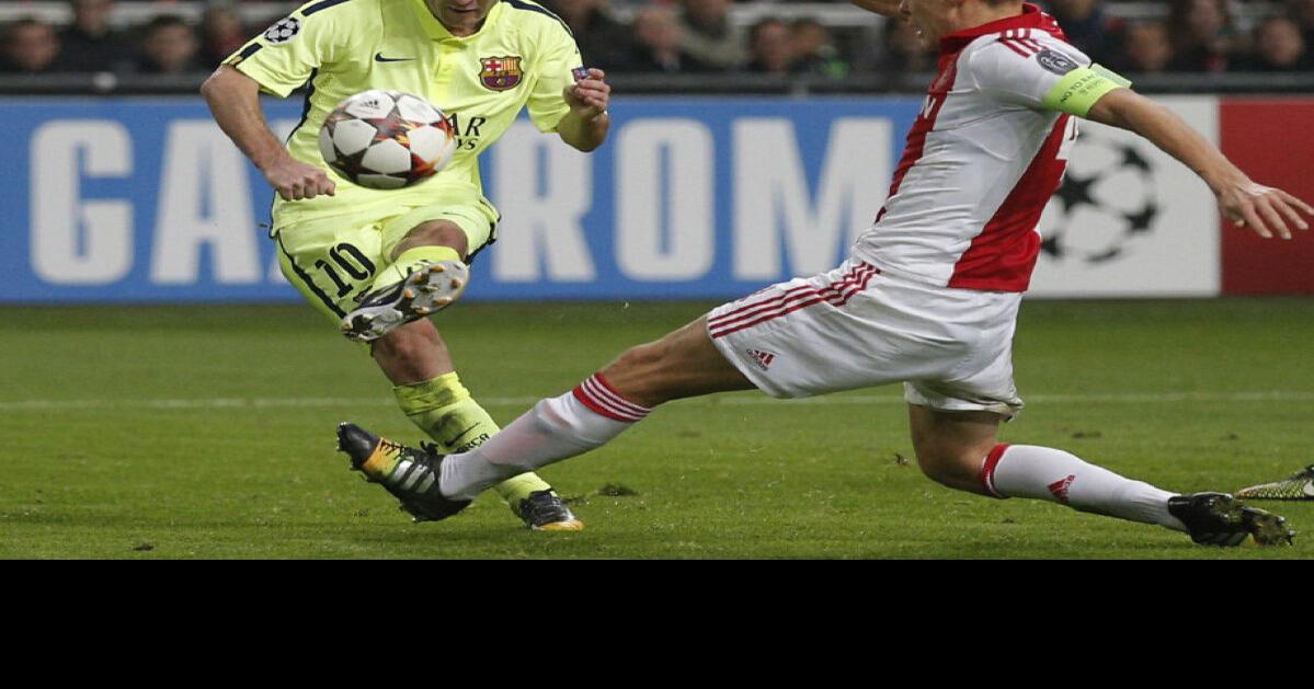 Messi leads Barcelona into Champions League knockout stage