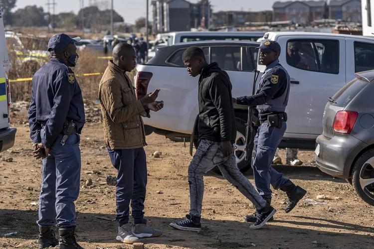 South Africa police say 15 killed in bar shooting in Soweto