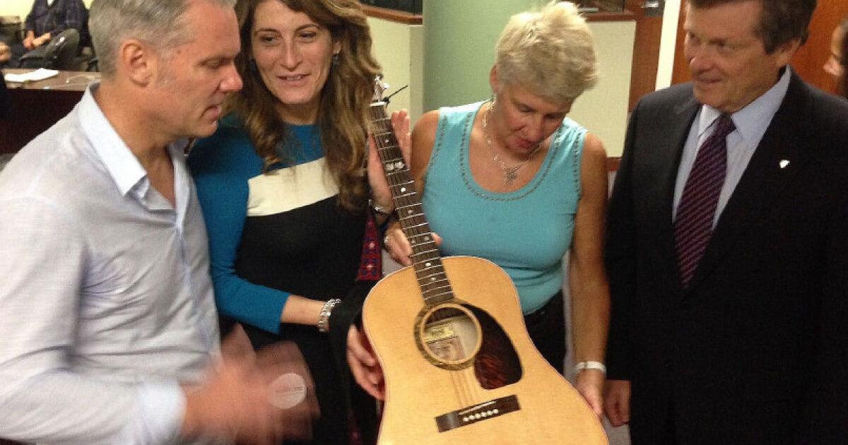 Guitar made from “Maple Leaf Forever” tree displayed at Toronto city hall