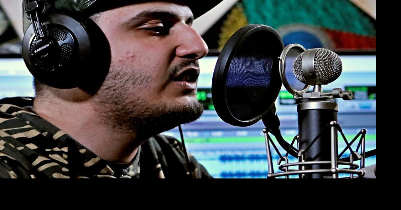 Iraqi rapper gives angry youth in city of Basra music outlet