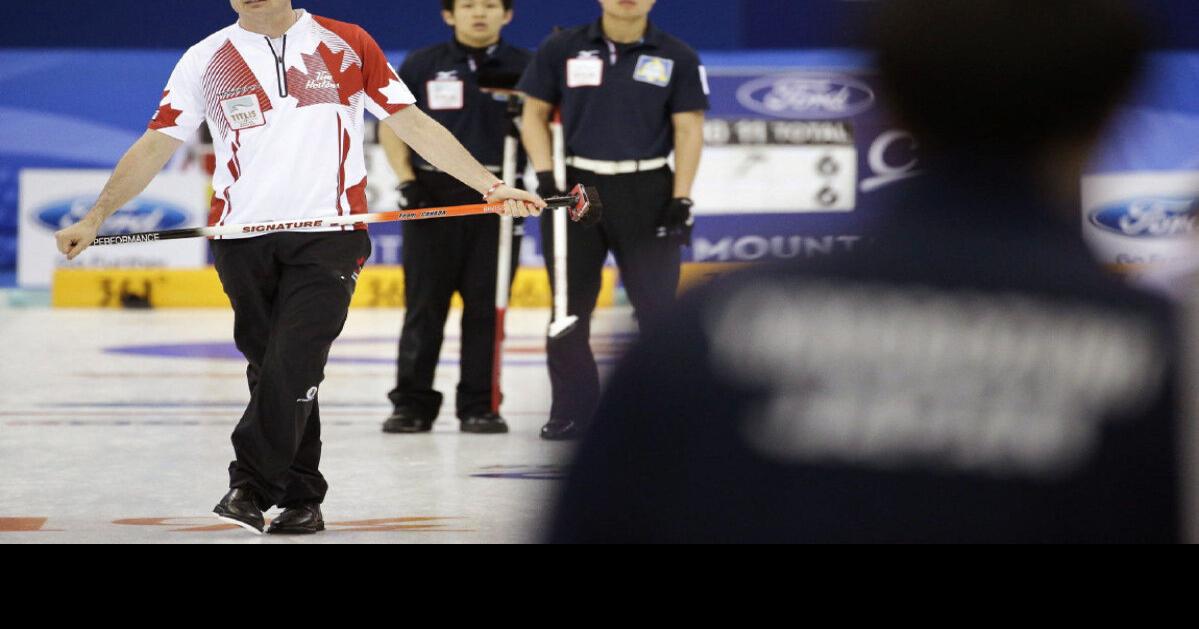 Canada's Kevin Koe splits his day at world curling championship