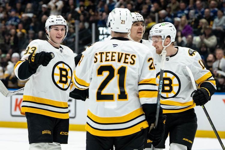 Minten scores in overtime, Boston Bruins top Vancouver Canucks 3-2