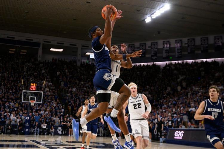 Mason Falslev scores 26 points to help No. 23 Utah State beat Nevada 71-62