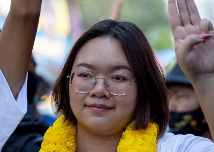 Thai activists report to police over lese majeste charges