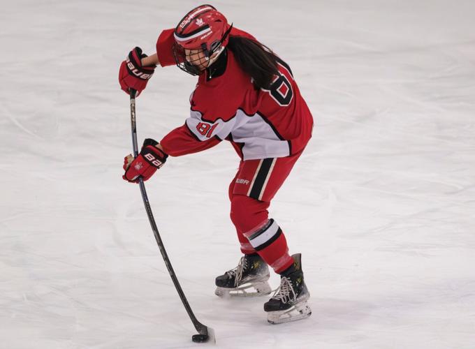 Is it better for girls to play minor hockey with boys?