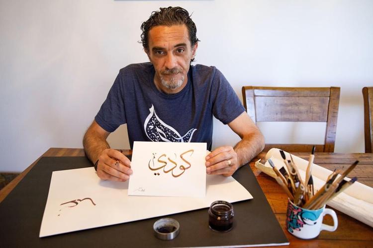 Syrian artist mixes messages of hope with Arabic calligraphy for ...