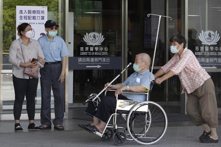 A Taiwan-based Buddhist charity attempts to take the founding nun's ...