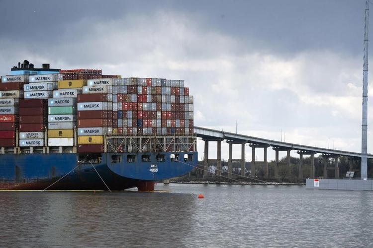Salvage crews have begun removing containers from the ship that ...