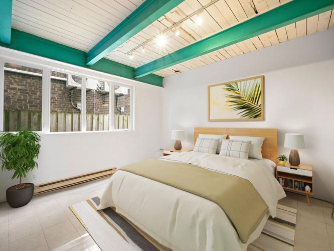 Inside this $980K ‘true hard loft’ townhouse in Toronto