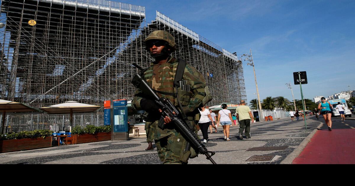 Brazilian soldiers in camouflage patrol Olympic venues in Rio