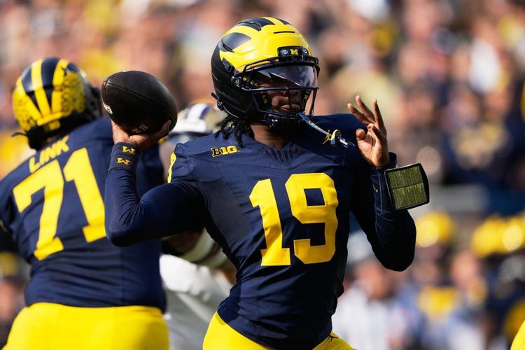 Michigan takes advantage of Washington turnovers, pulls away to win 24 ...