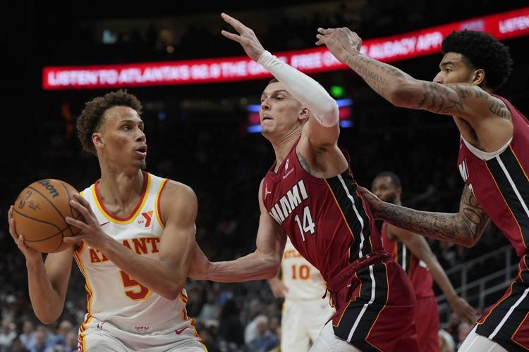 Hawks allow their fewest points in nearly 4 years, shut down Heat 98-86
