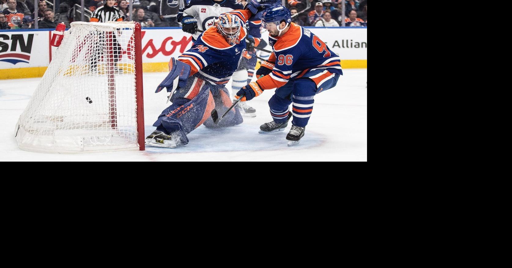 Connor's OT winner lifts Jets past Oilers, who lost McDavid late