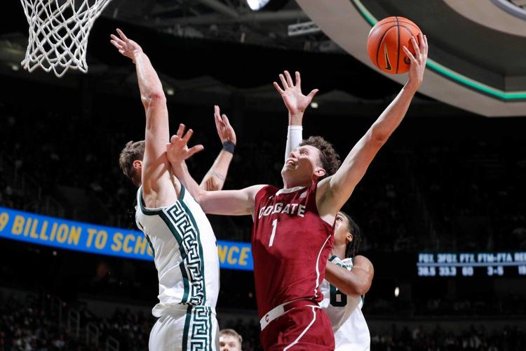 Kohler scores 16 points in No. 22 Michigan State's 80-69 win over Colgate