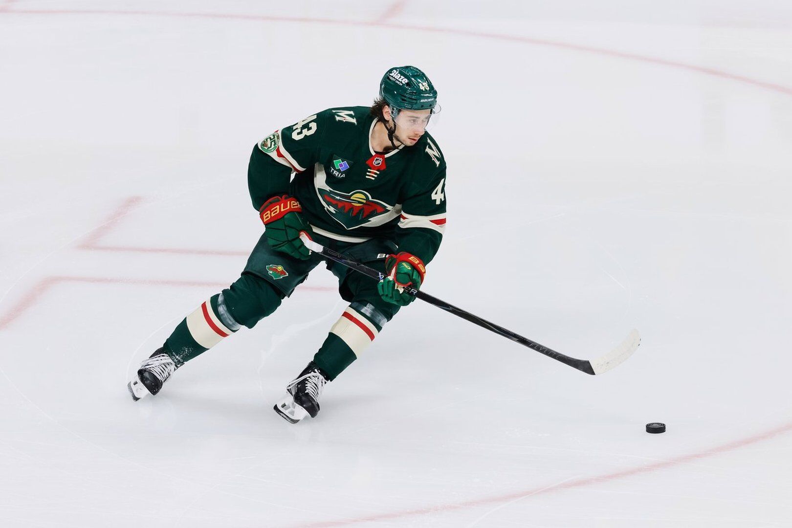 Quinn Hughes completes a Wild few days with a goal in first game with ...