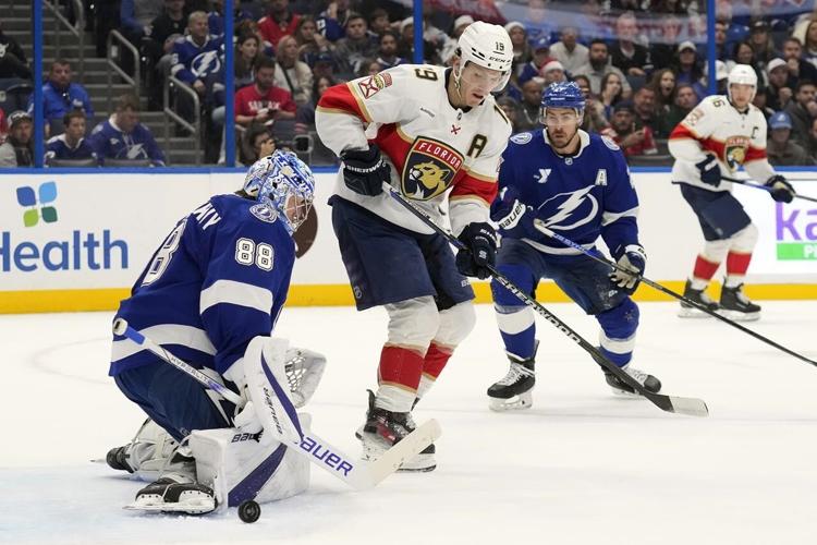 Panthers use short-handed goals to beat Lightning 4-2 in opener of home ...
