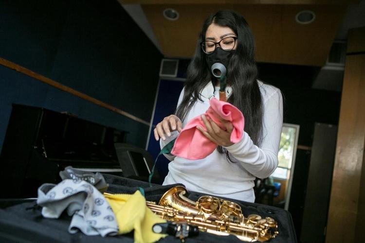 Mexican musician finds refuge in saxophone after acid attack