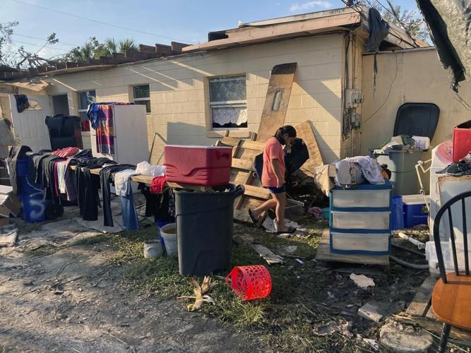 Poor Florida neighborhood battered by flood tries to recover